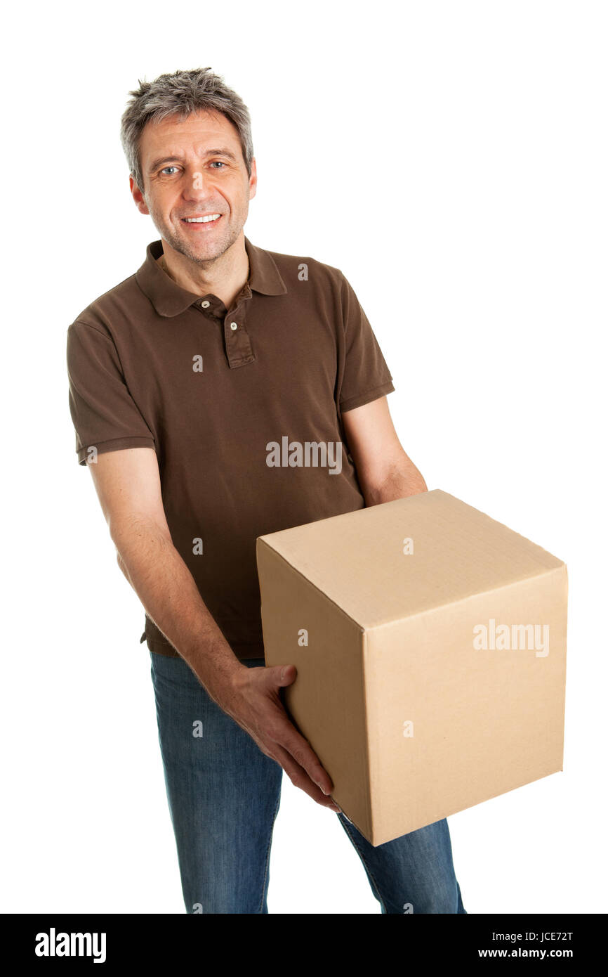 Delivery man holding package box. Isolated on white Stock Photo - Alamy