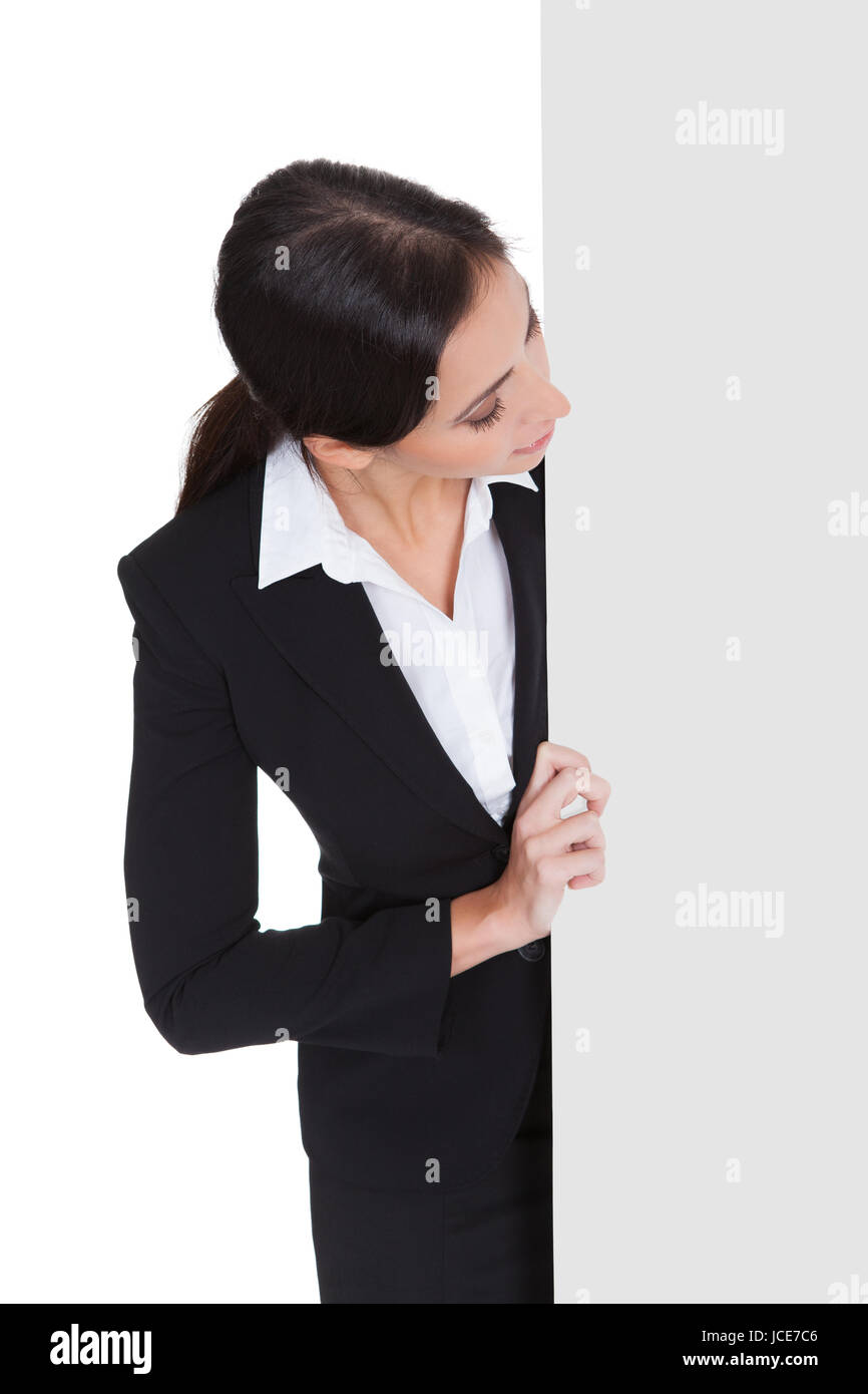 Happy Smiling Young Business Woman Holding Blank Placard. Isolated On ... Happy Smiling Young Business Woman Holding Blank Placard. Isolated On ...