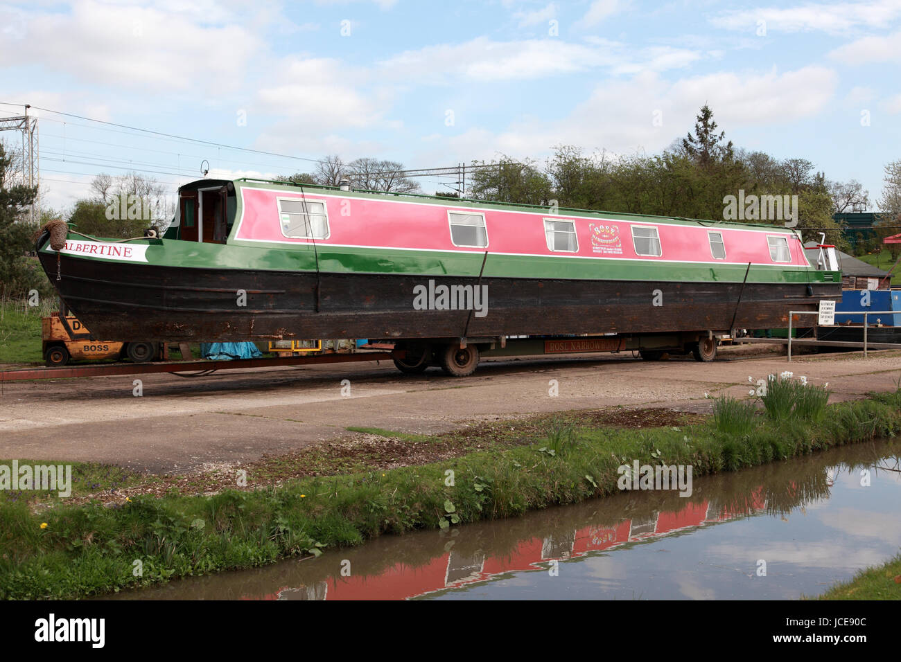 A canal narrowboat out of the water and about to be transported Stock ...