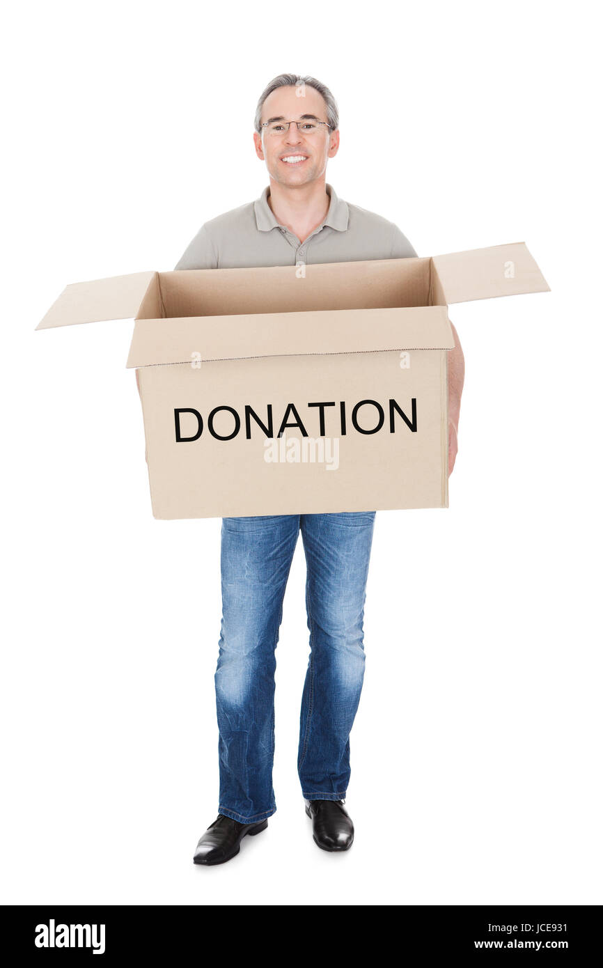 Happy man holding donation box isolated on white background Stock Photo ...