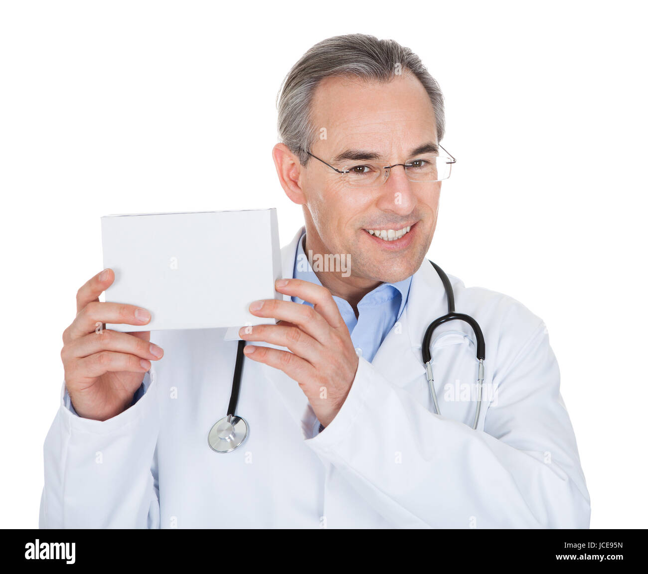 Doctor holding prescription note isolated on white background Stock ...