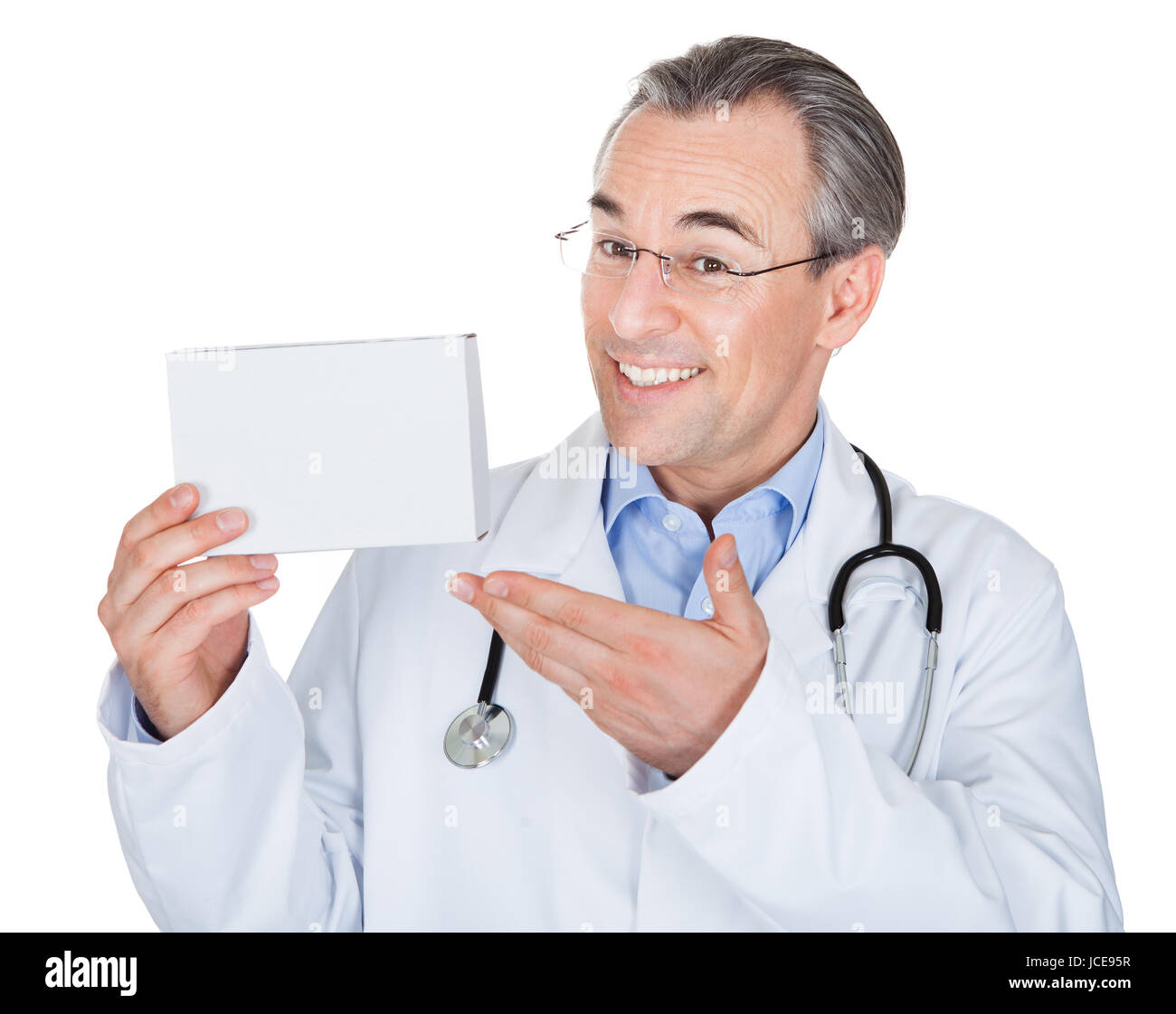 Doctor holding prescription note isolated on white background Stock ...