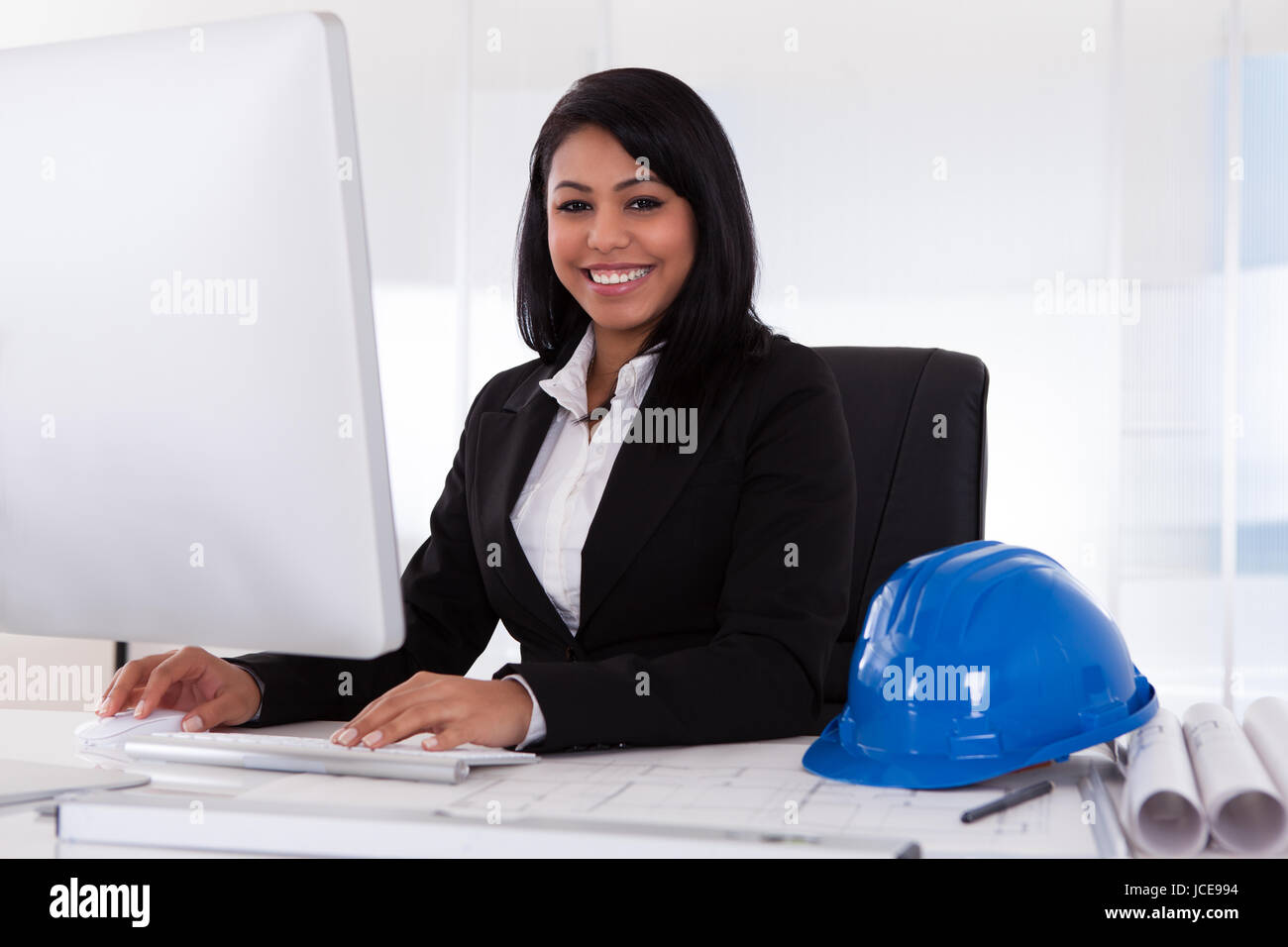 African american architect typing hi-res stock photography and images ...