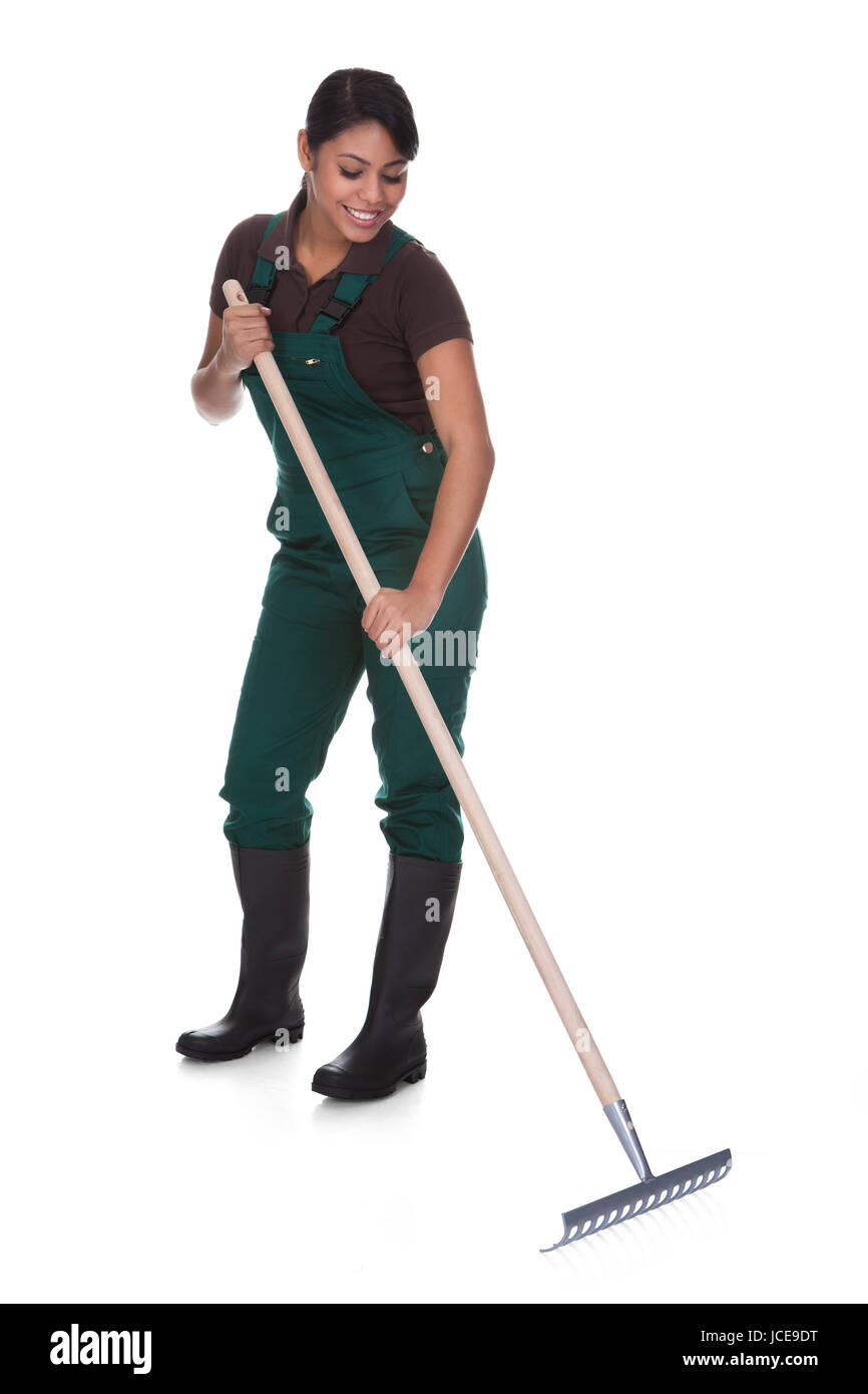 Young Female Gardner With Gardening Tools Isolated Over White ...