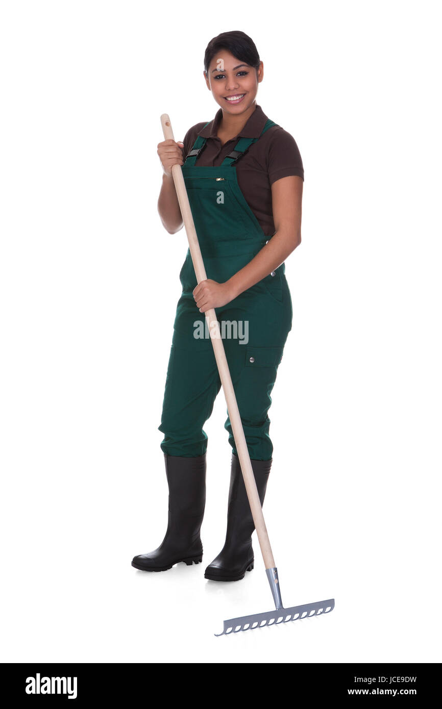 Young Female Gardner With Gardening Tools Isolated Over White ...