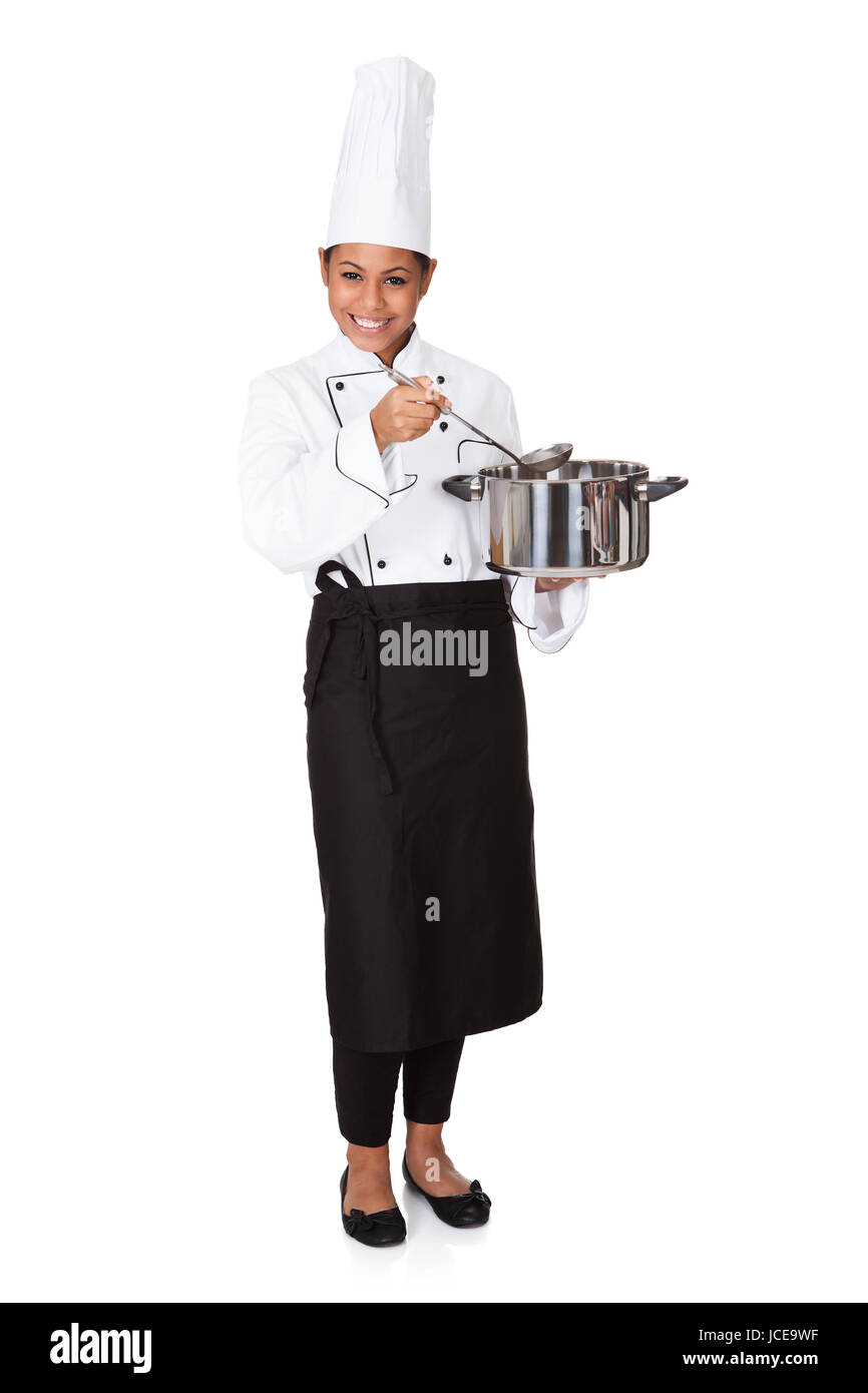 Female Chef With Cooking Pot In Hand. Isolated On White Stock Photo - Alamy
