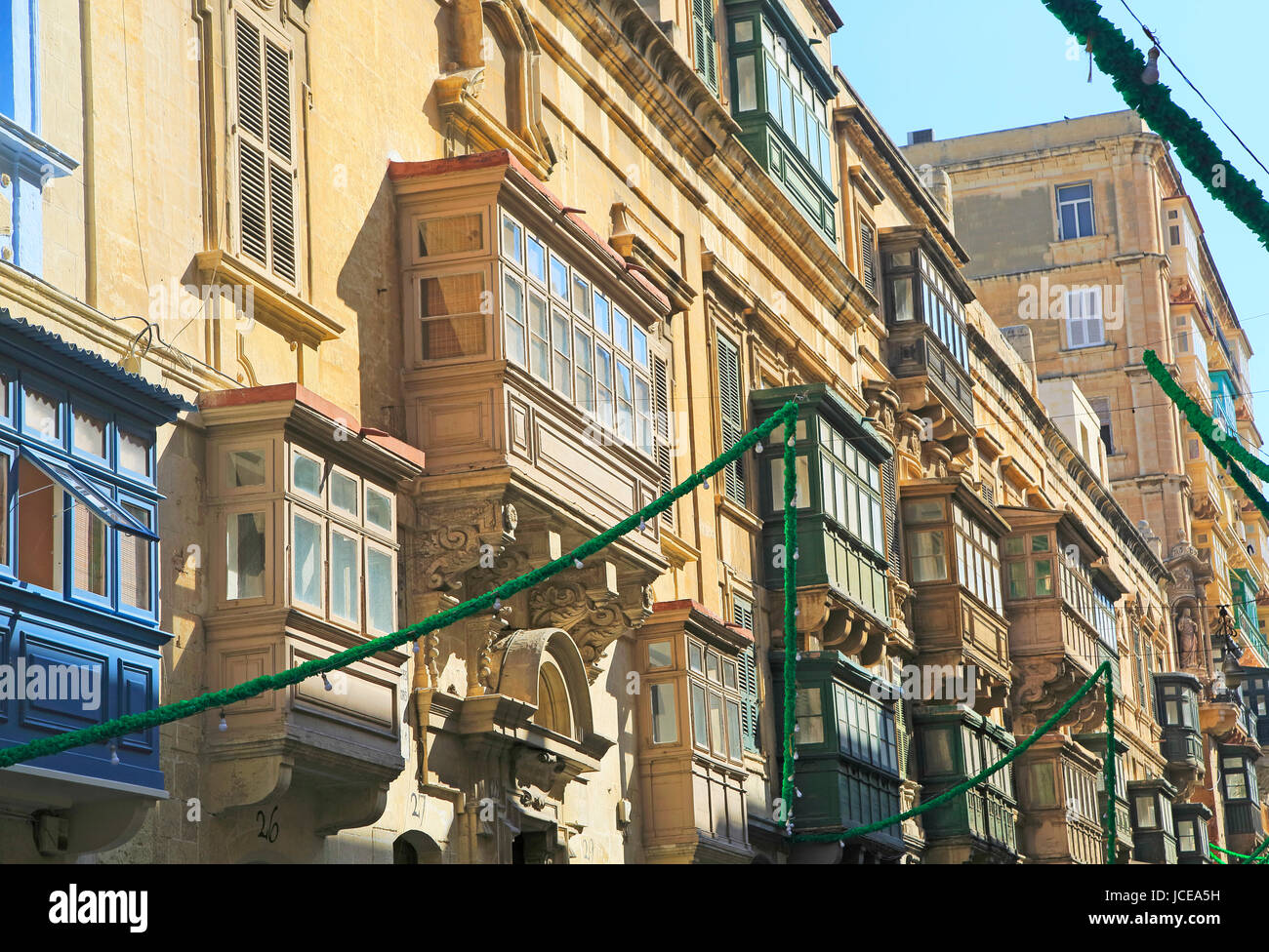 Famous balconies of houses historic street in city centre of Valletta ...