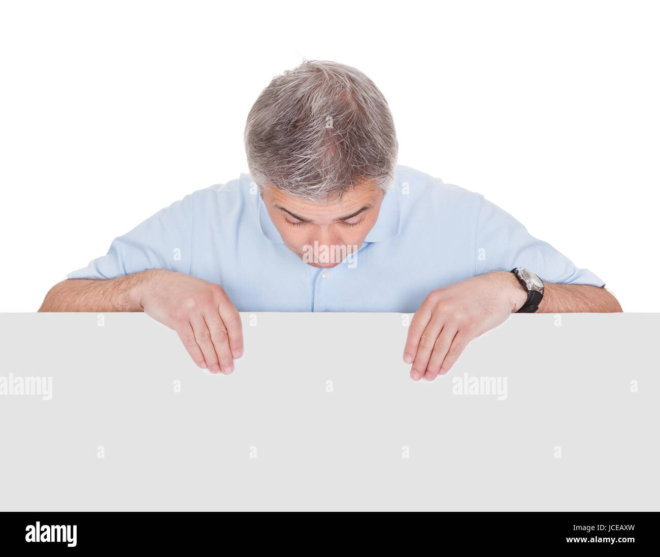 Man Presenting Blank Placard Over White Background Stock Photo - Alamy