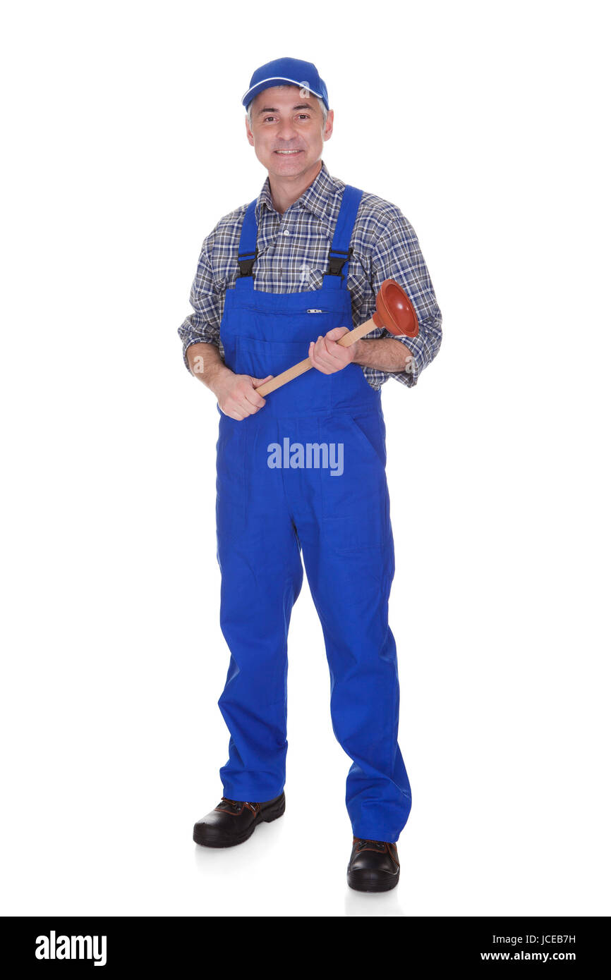 Portrait Of Male Plumber Holding Plunger Over White Background Stock ...