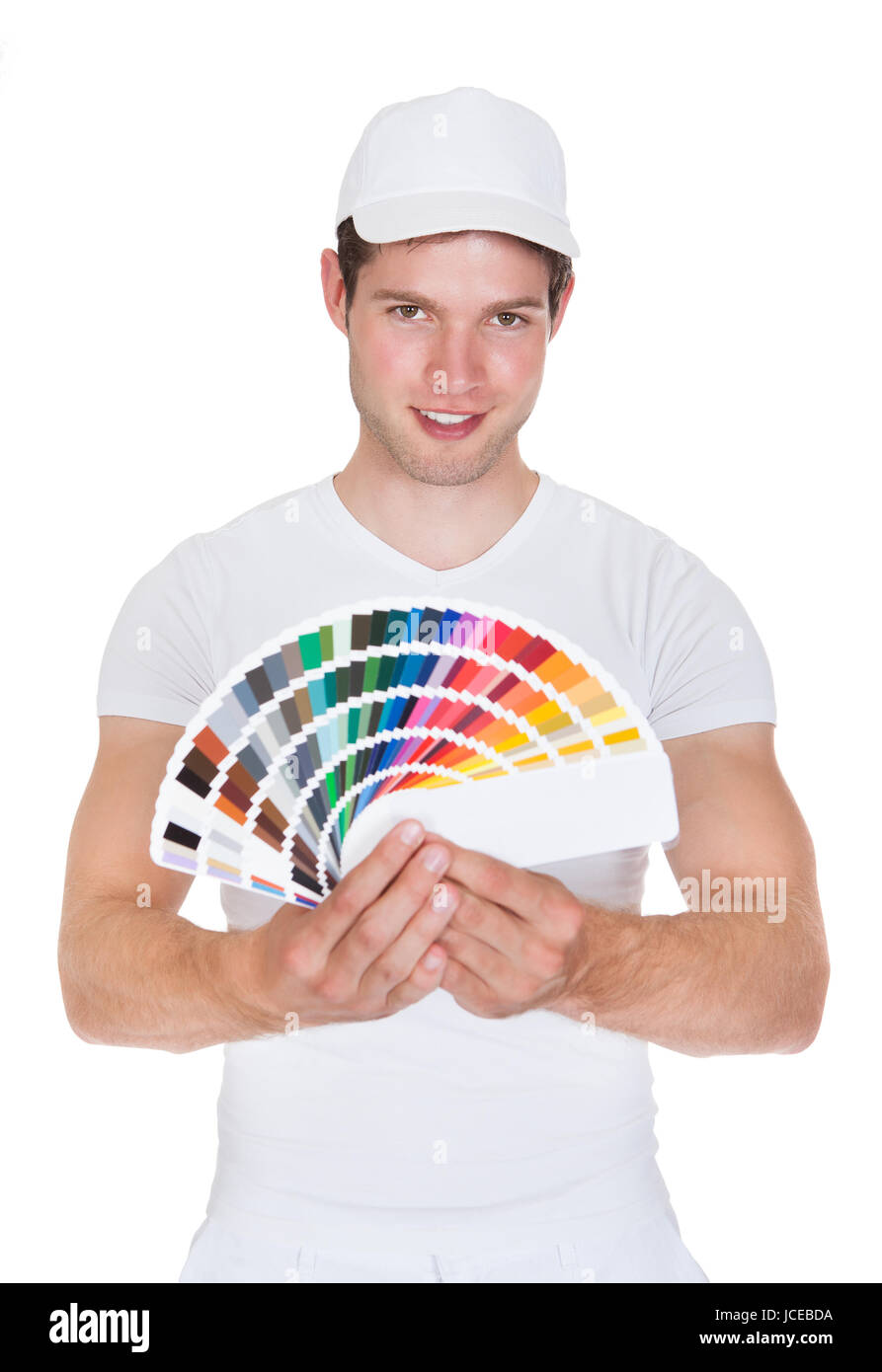 Young Man Holding Color Palette Isolated On White Background Stock ...