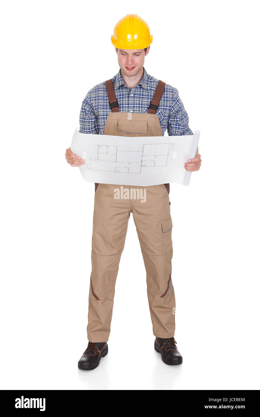 Portrait Of A Male Architect Holding Architectural Plan On White ...