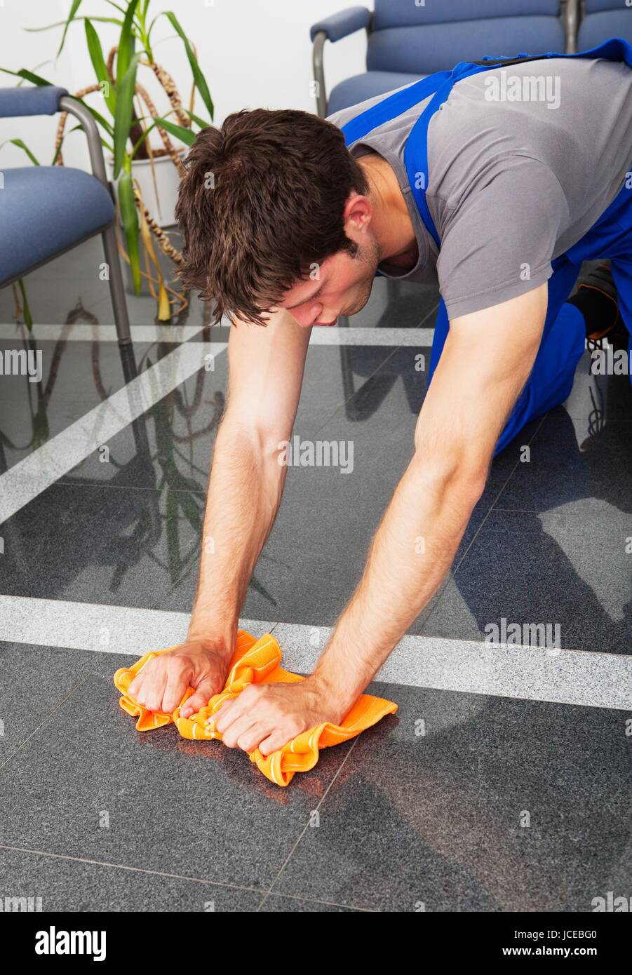Workers polish floor hi-res stock photography and images - Alamy