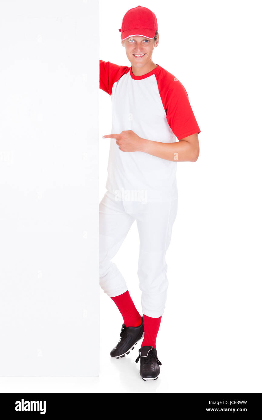 Baseball Player Holding Blank Placard Over White Background Stock Photo ...