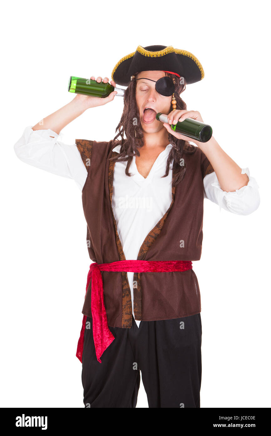 Pirate Standing On White Background Drinking Beer Stock Photo - Alamy
