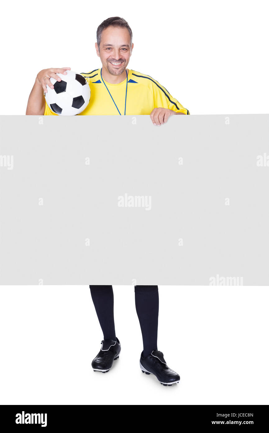 Portrait Of Happy Coach Holding Placard And Football Isolated On White ...