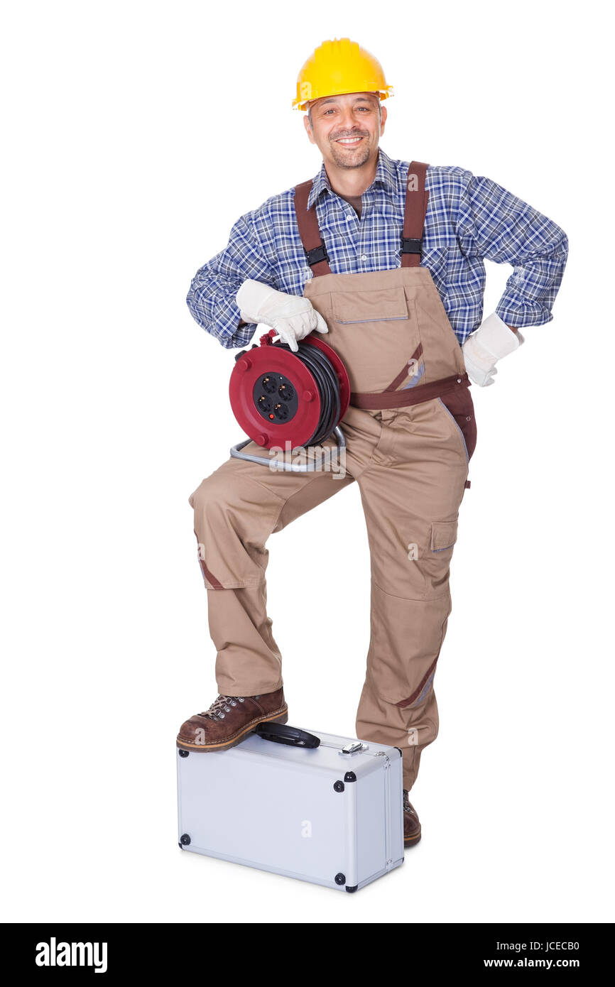 Happy Construction Worker Holding Toolbox And Cable On White Background ...