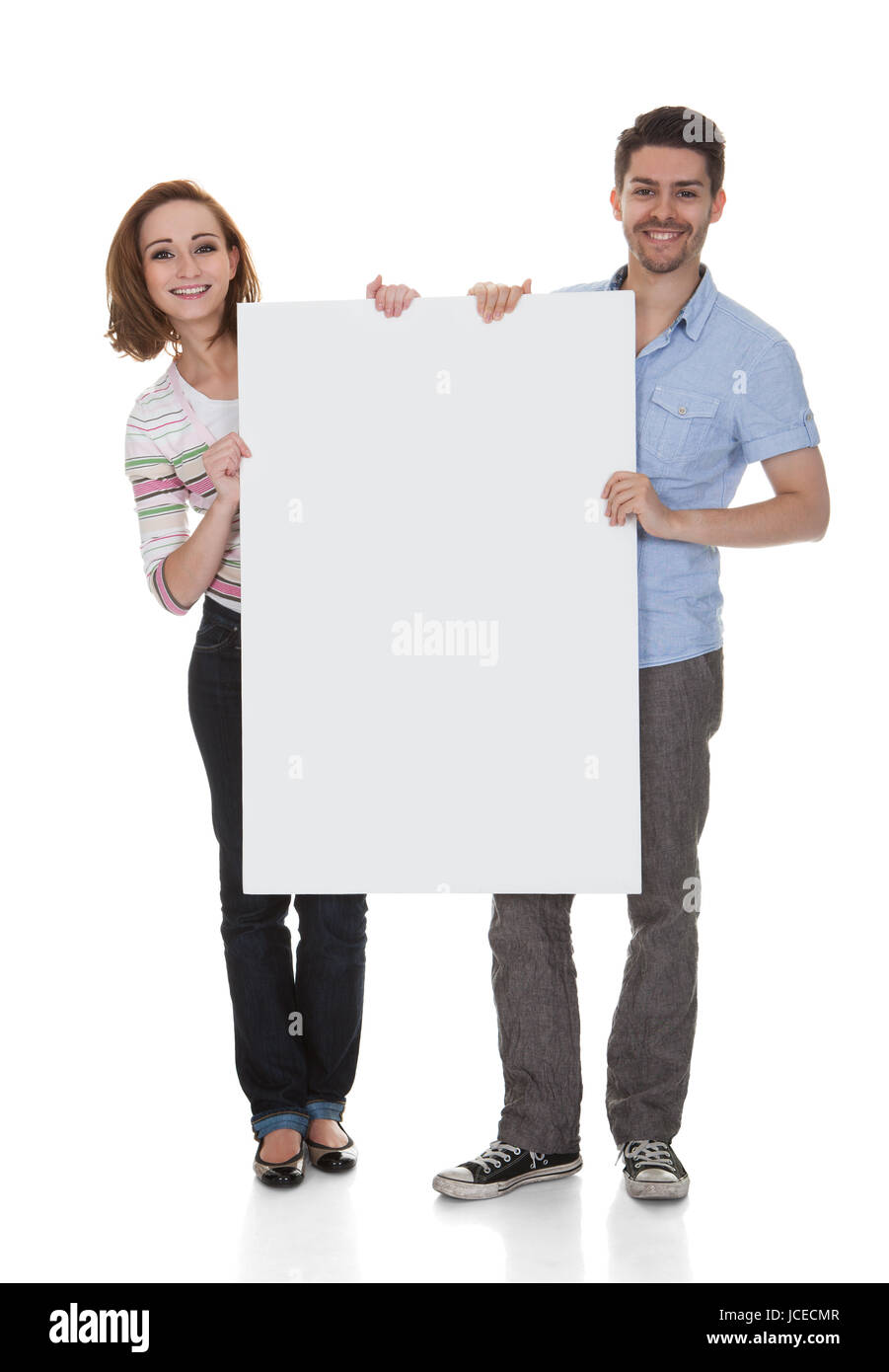 Young Happy Couple Holding Placard Over White Background Stock Photo ... Young Happy Couple Holding Placard Over White Background Stock Photo ...