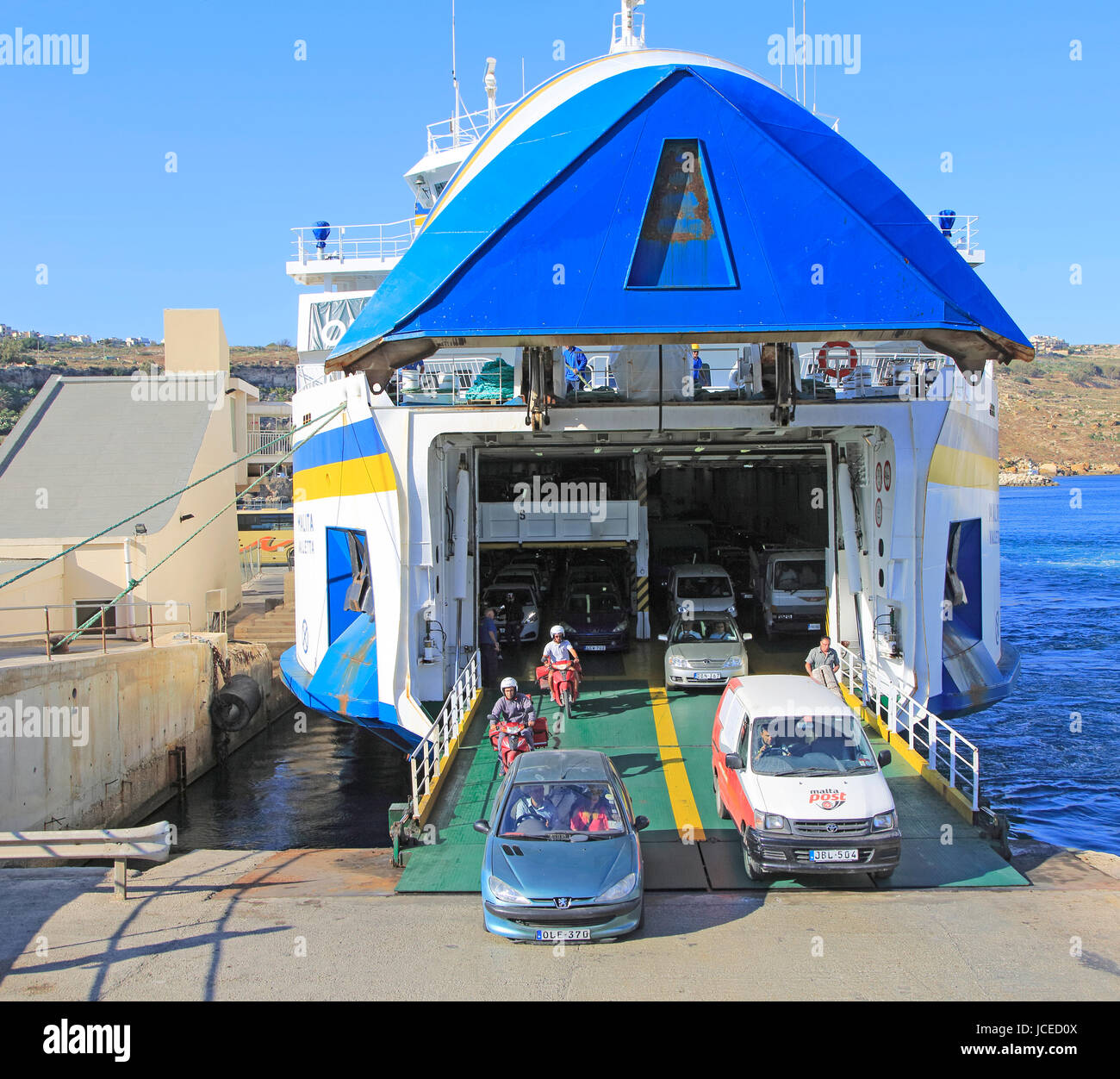 Vehicle ferry disembarkation at port, Gozo Channel Line Ferries, Mgarr ...