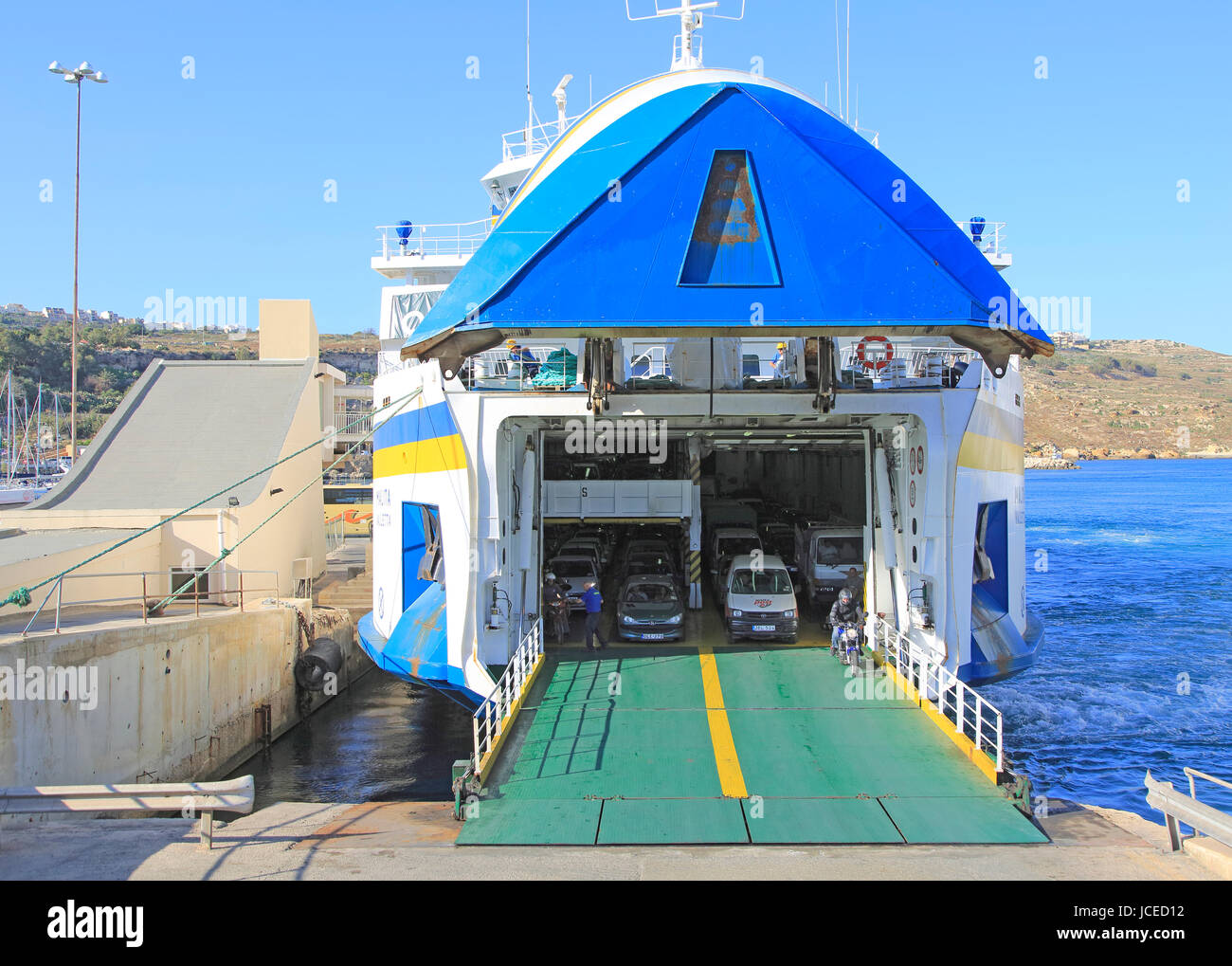 Vehicle ferry disembarkation at port, Gozo Channel Line Ferries, Mgarr ...