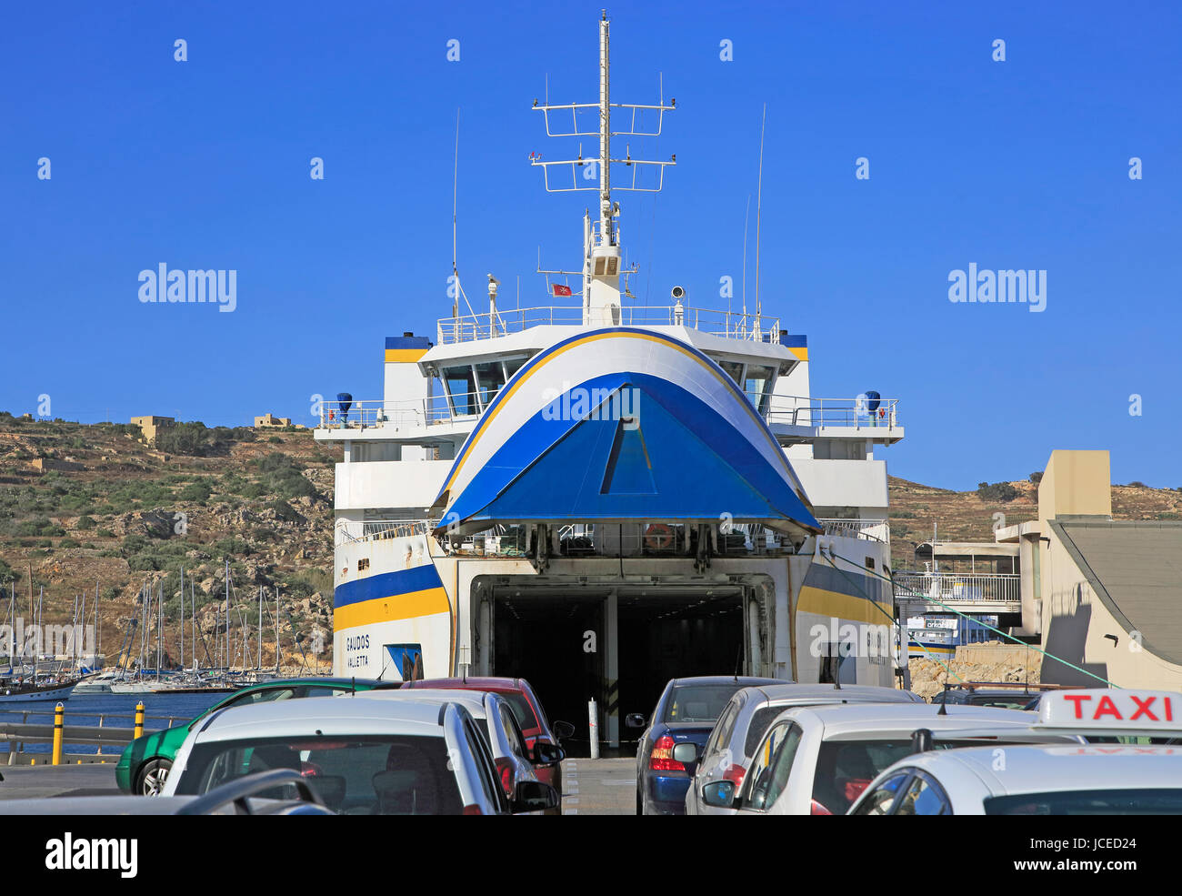 Vehicle ferry line of cars waiting to embark, Gozo Channel Line Ferries ...