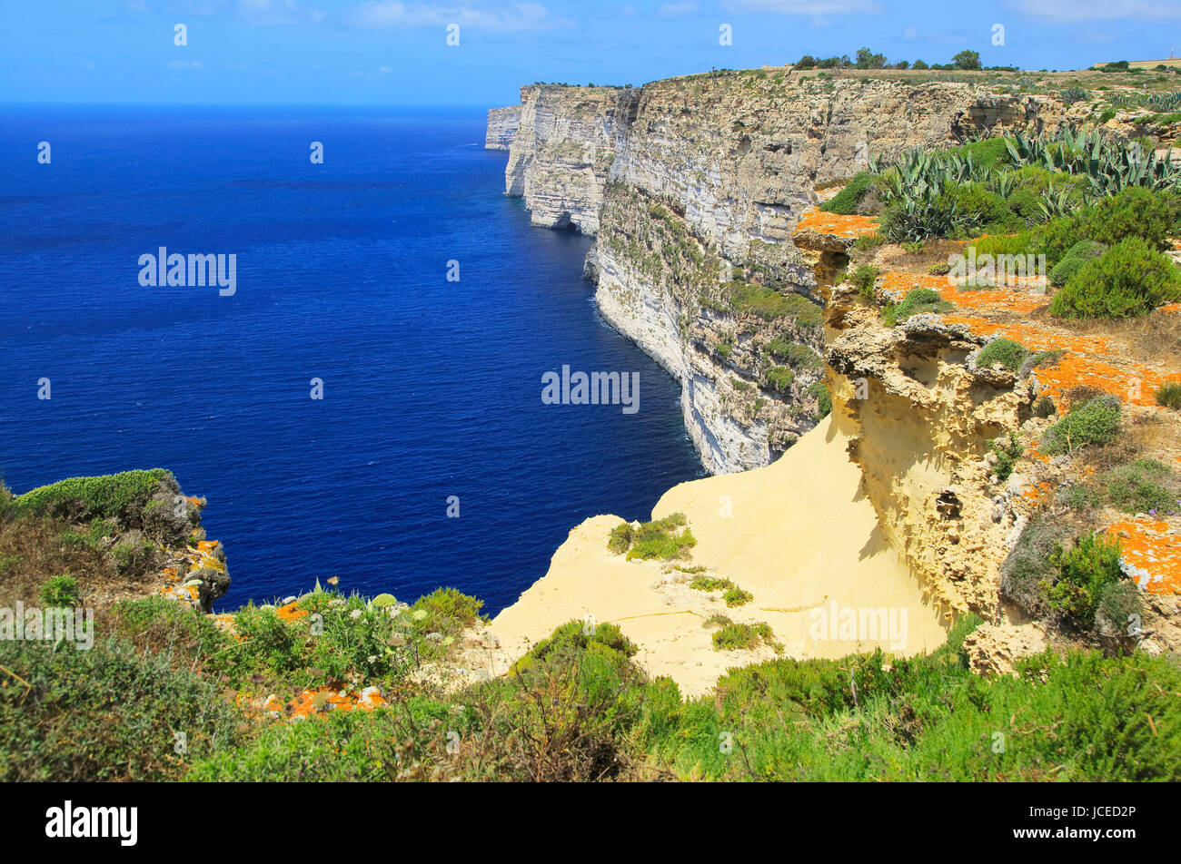 Coastal clifftop landscape view westwards at Ta' Cenc cliffs, island of ...