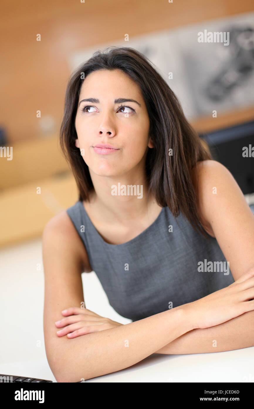 Portrait of office-worker with thoughtful look Stock Photo - Alamy