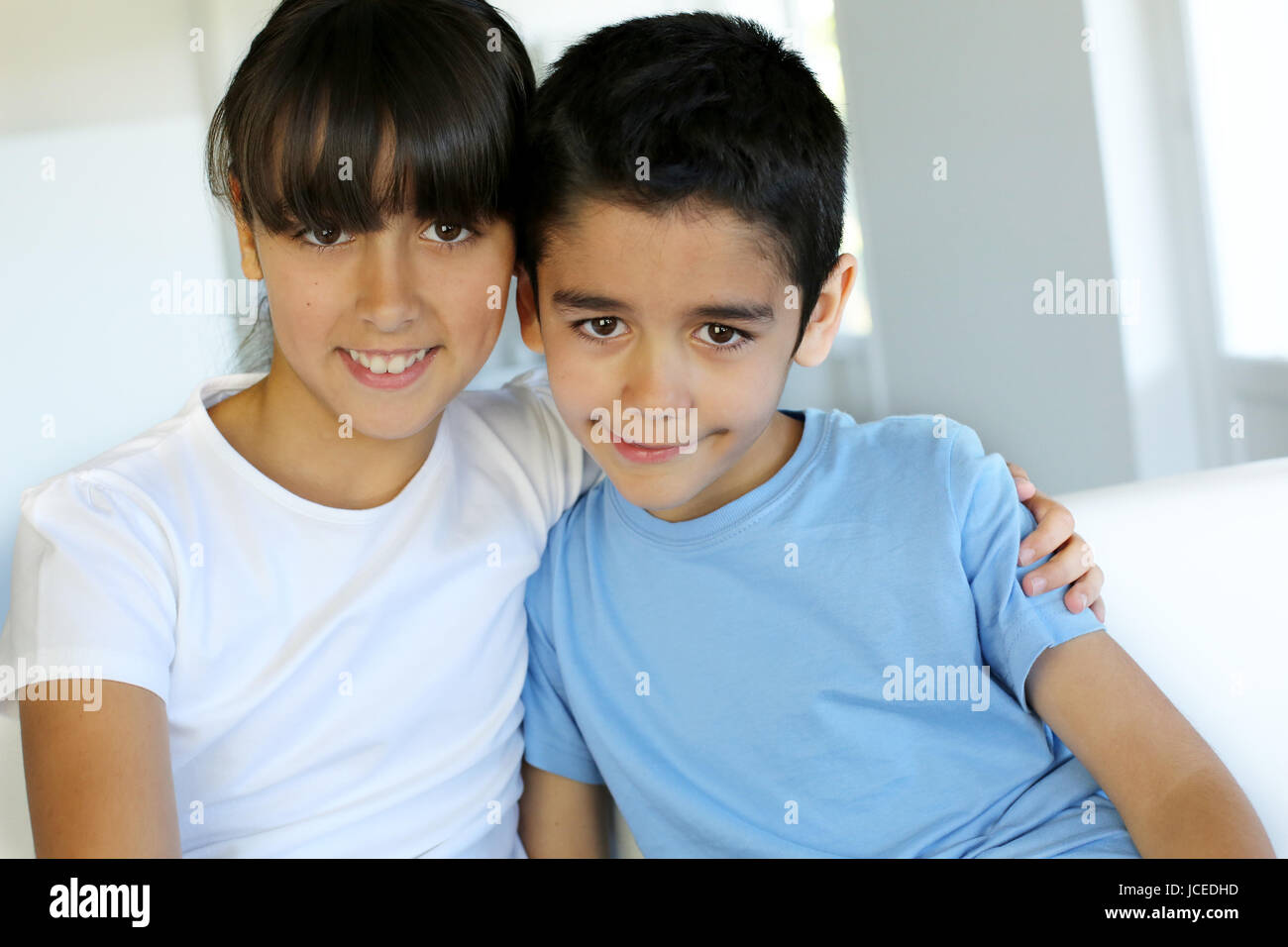 Portrait of smiling brother and sister Stock Photo - Alamy