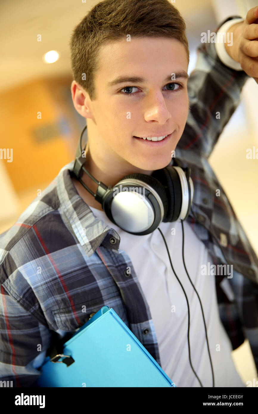Trendy young student boy with music headphones Stock Photo - Alamy
