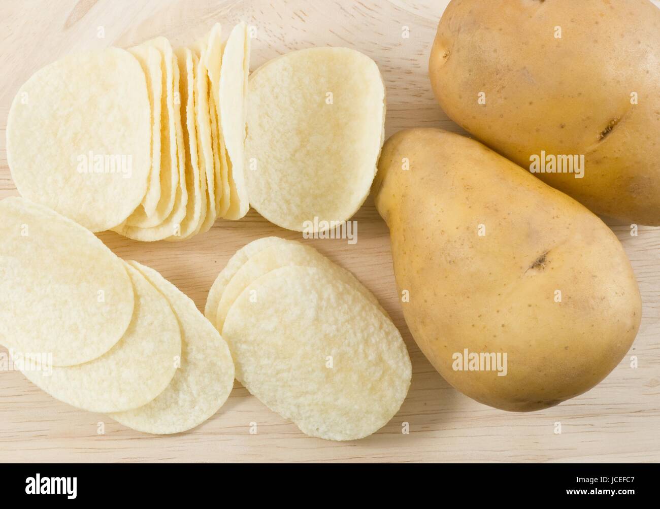 Snack Food, Top View of Potato Tuber with Potato Chips or Crisp on A ...