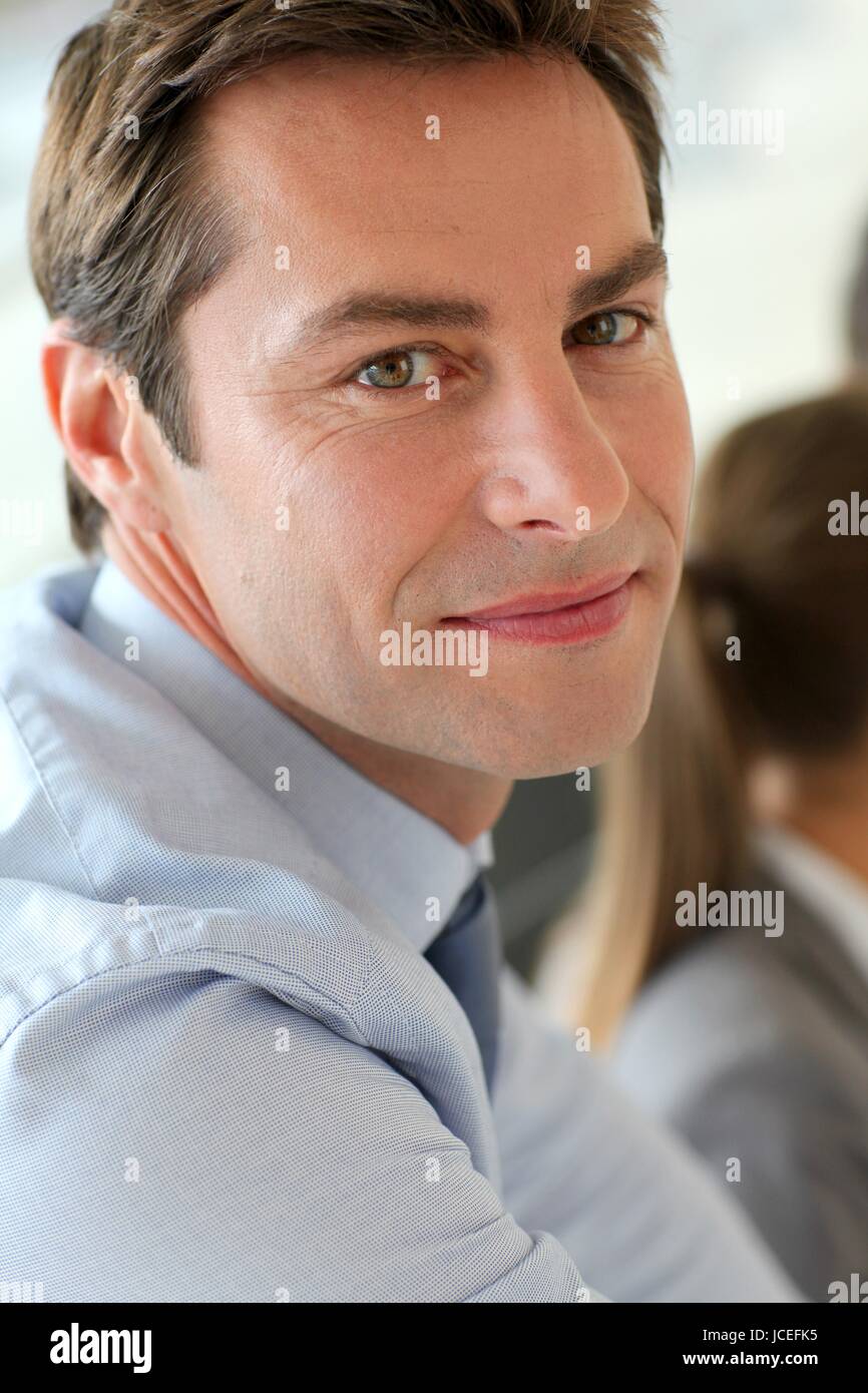 Work laughing attending hi-res stock photography and images - Alamy