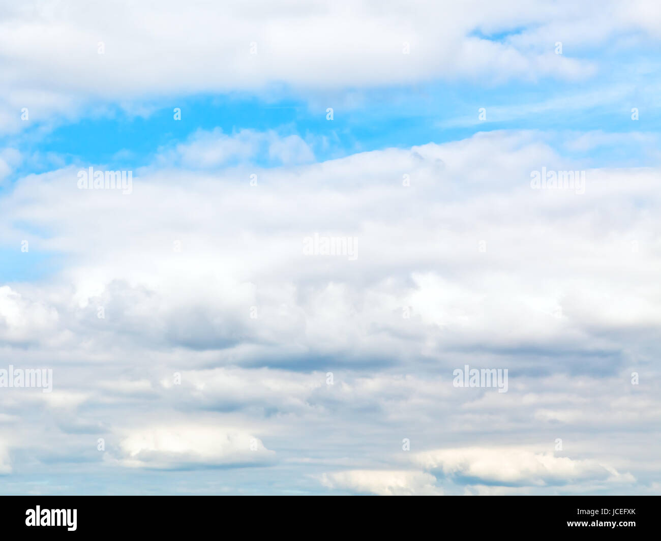layers of white cumulus clouds in blue autumn sky - natural background Stock Photo - Alamy