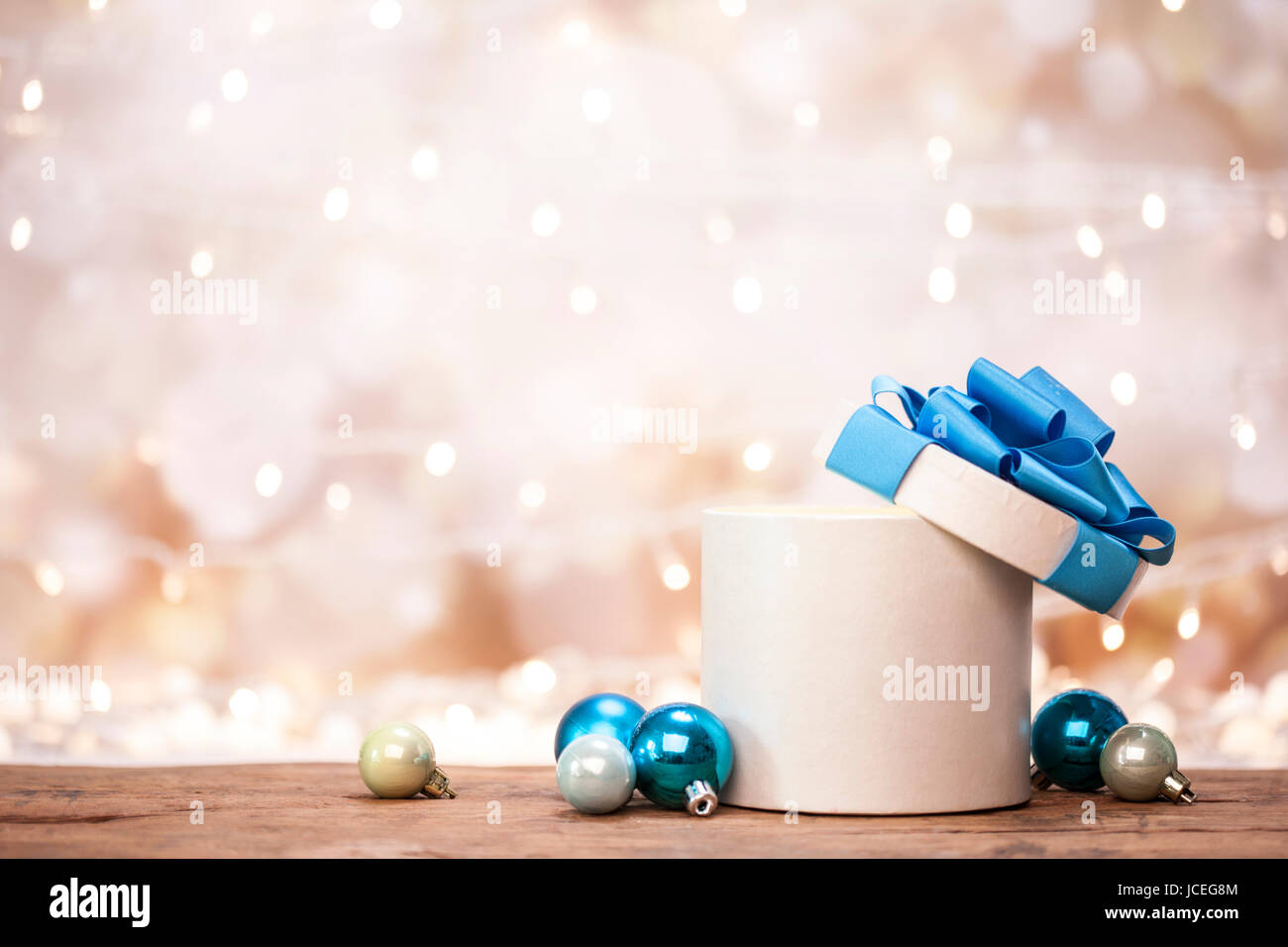 Open present box with Christmas ornaments Stock Photo - Alamy