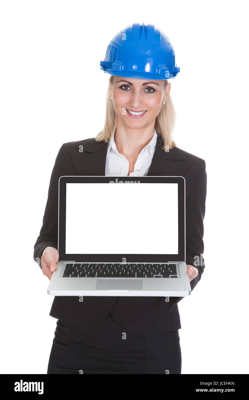 Portrait Of Happy Female Architect Holding Laptop Over White Background ...