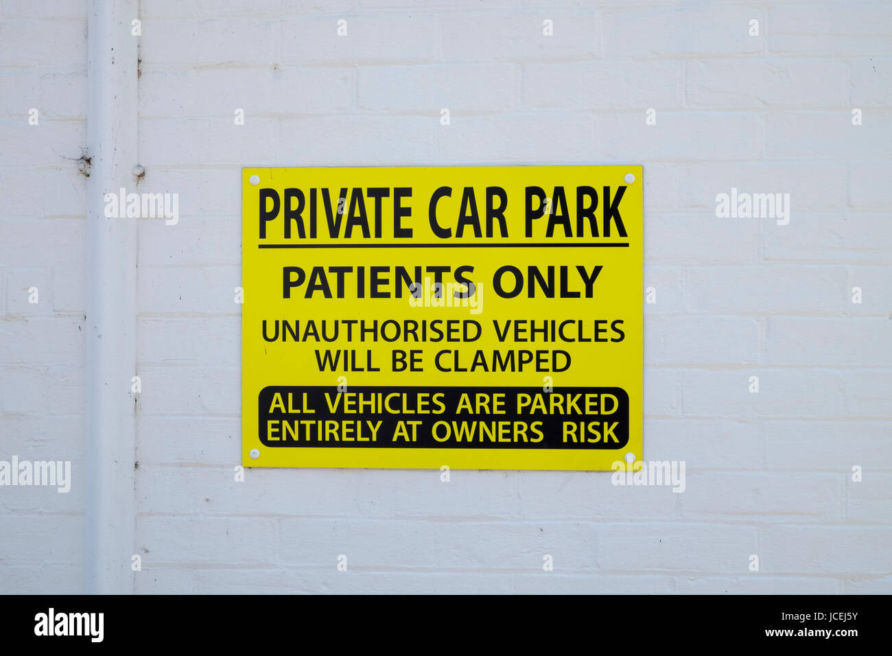 bright yellow private car park patients only sign signage. Ashford ...