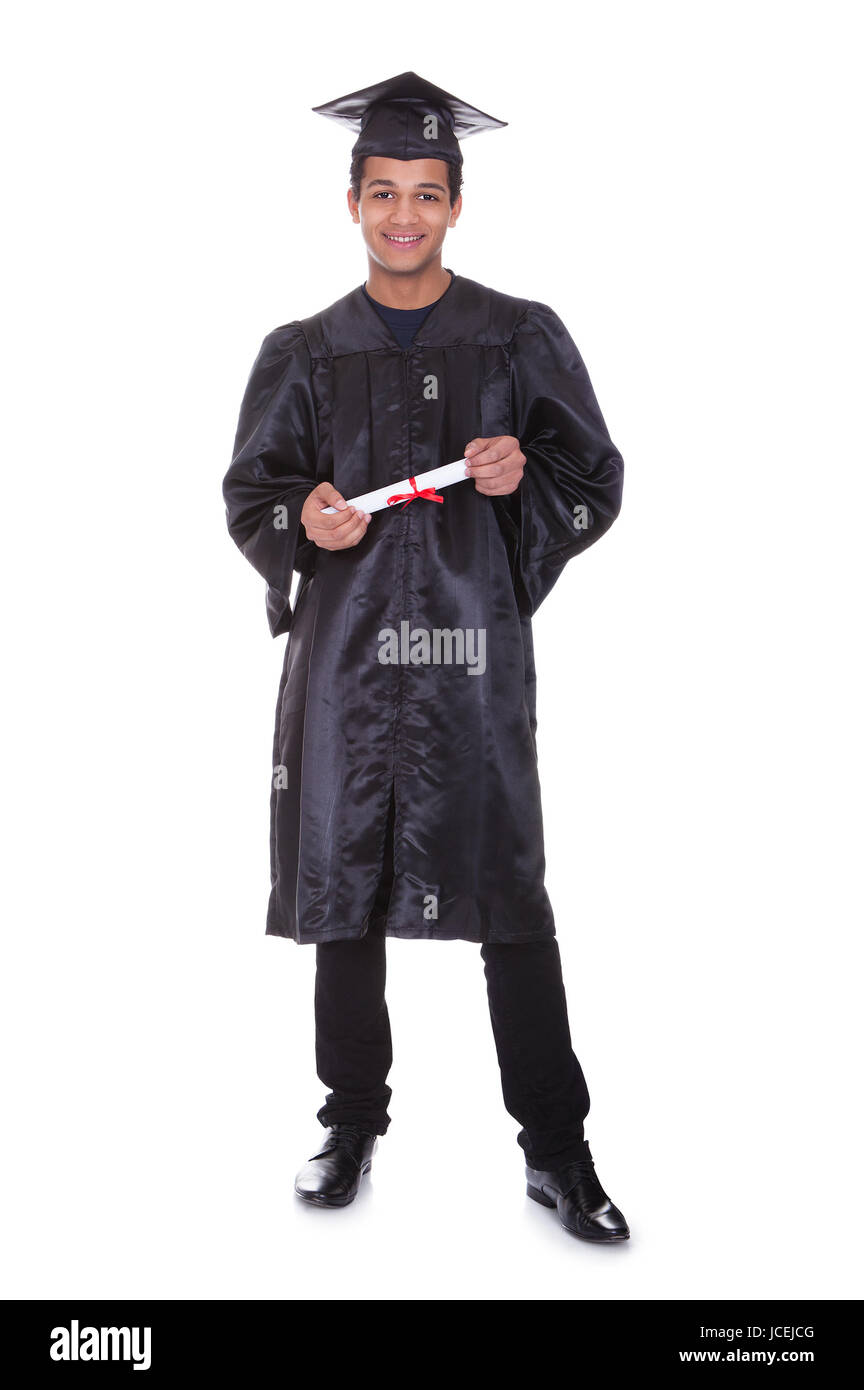 Cheerful young graduation man. Isolated on white Stock Photo - Alamy