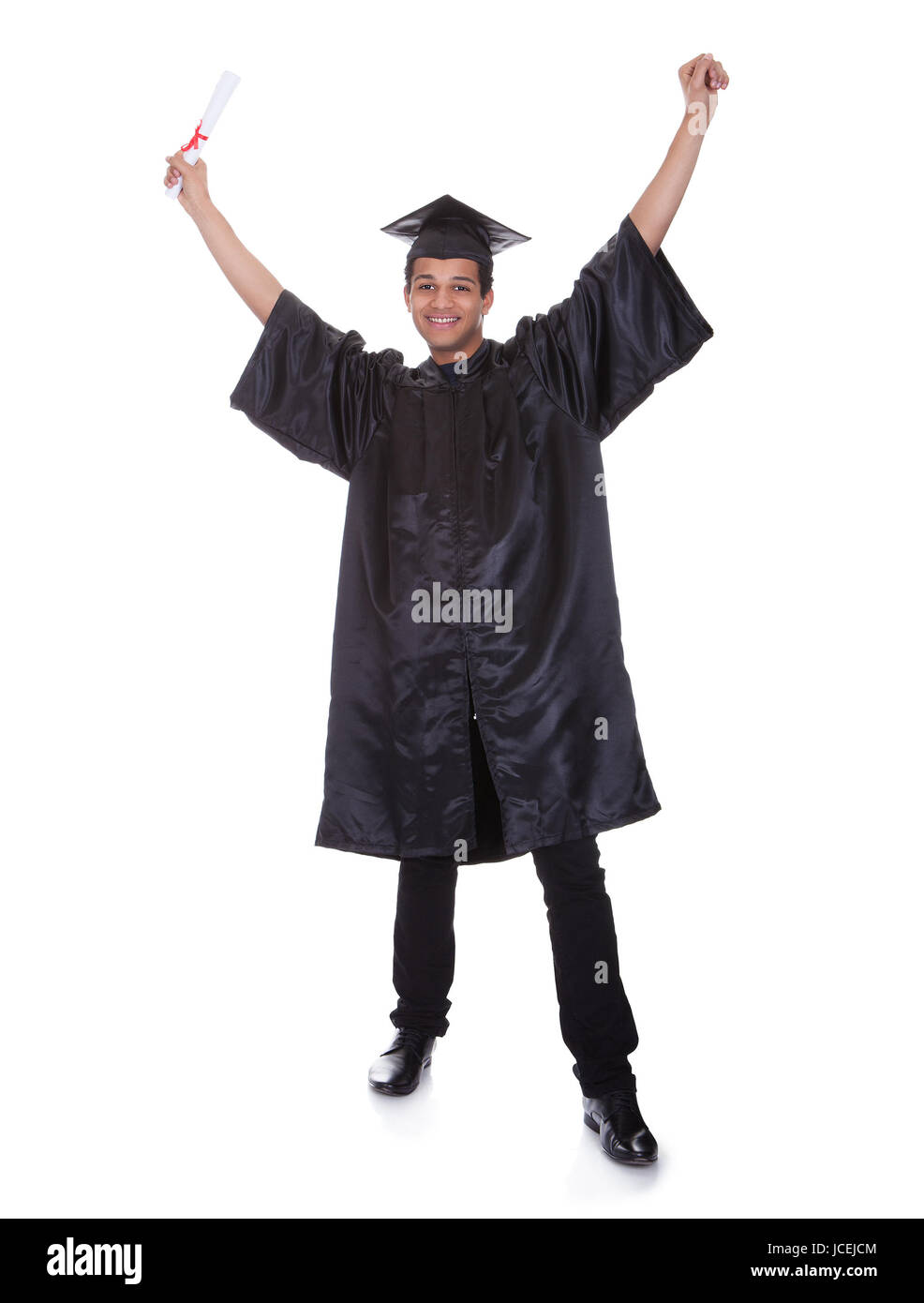 Excited young graduation man. Isolated on white Stock Photo - Alamy