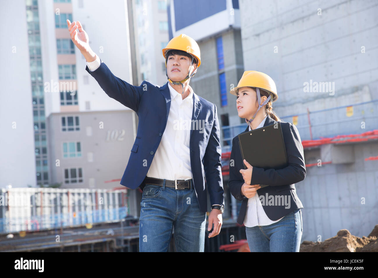 Architects at construction site Stock Photo - Alamy