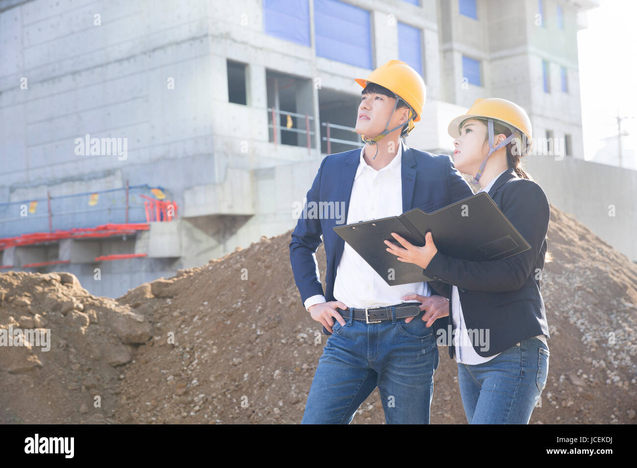 Two architects at construction site Stock Photo - Alamy