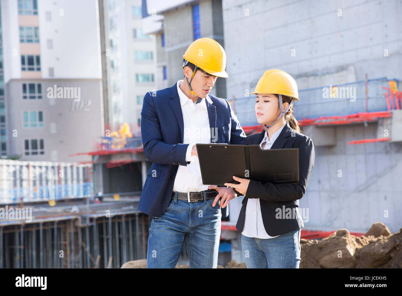 Two architects at construction site Stock Photo - Alamy