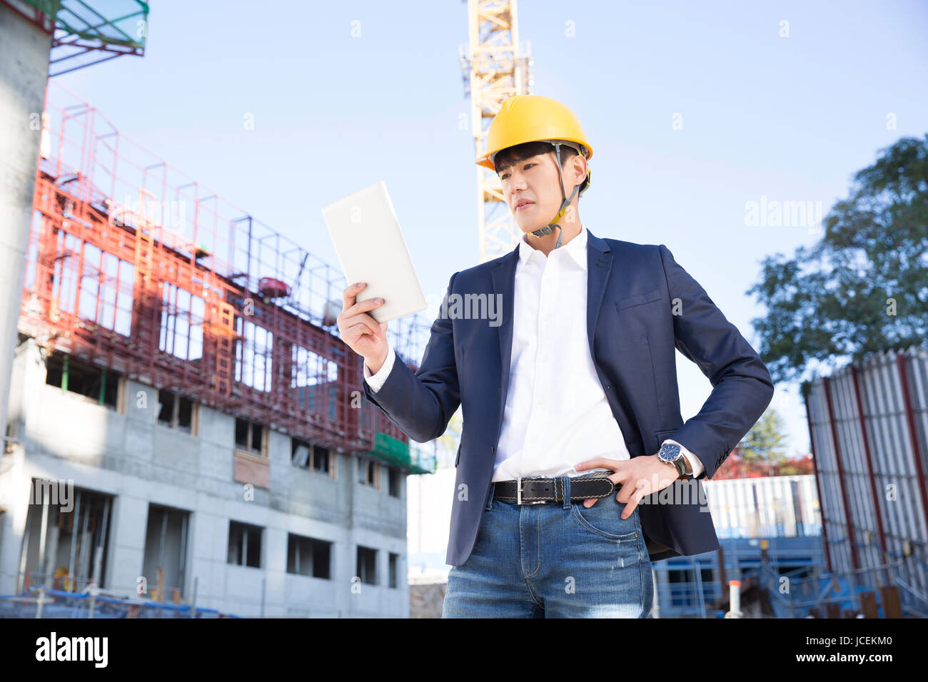Architect at construction site Stock Photo - Alamy