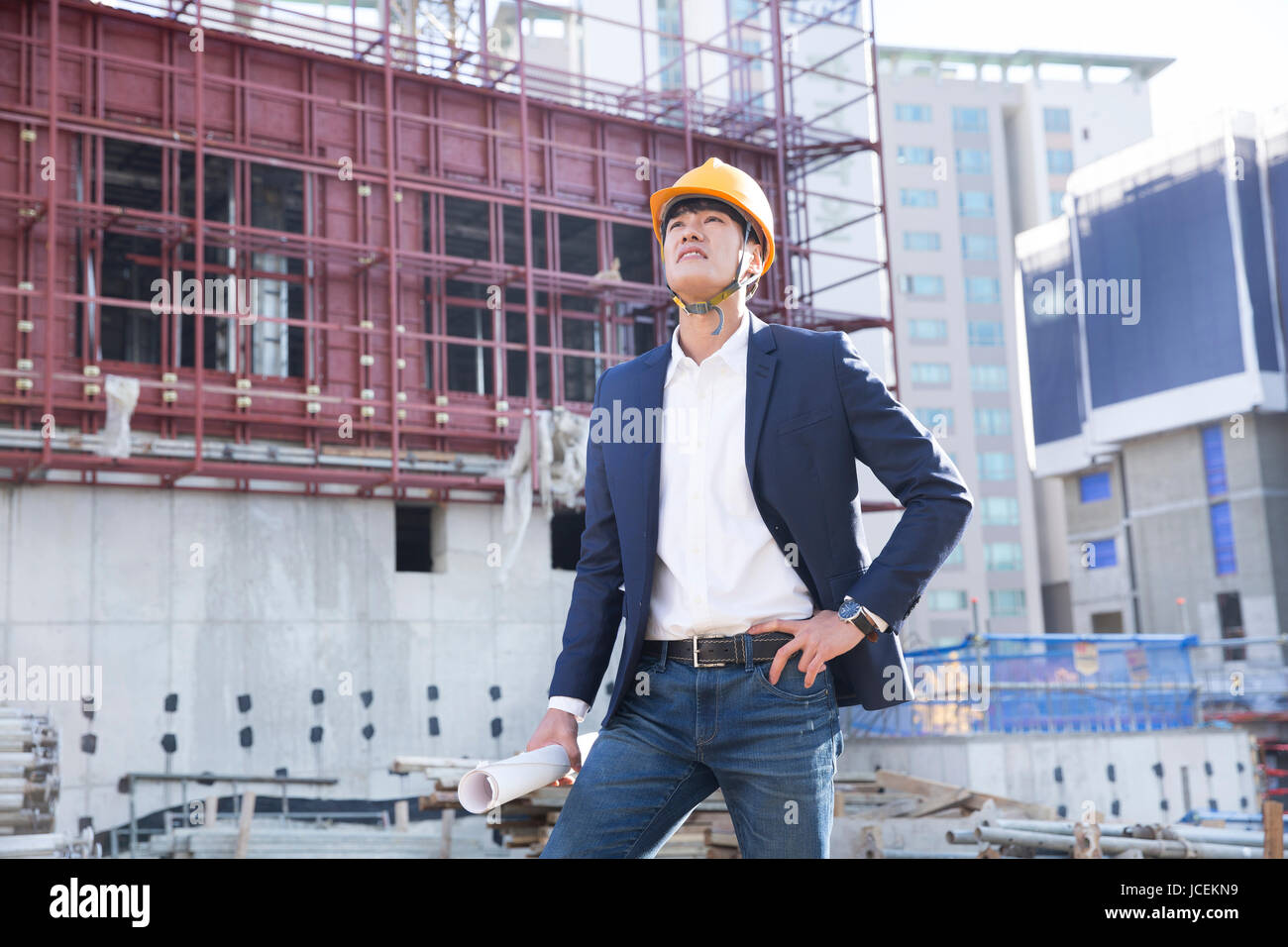 Architect posing at construction site Stock Photo - Alamy