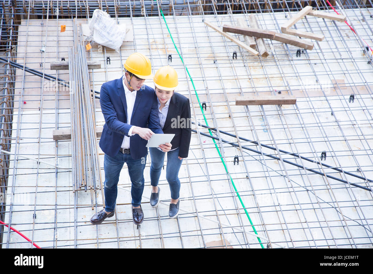 Two architects at construction site Stock Photo - Alamy