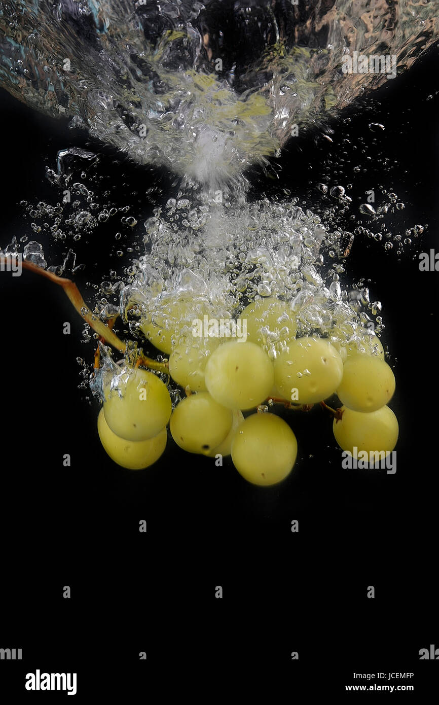 Green grapes in the water,water splash Stock Photo - Alamy