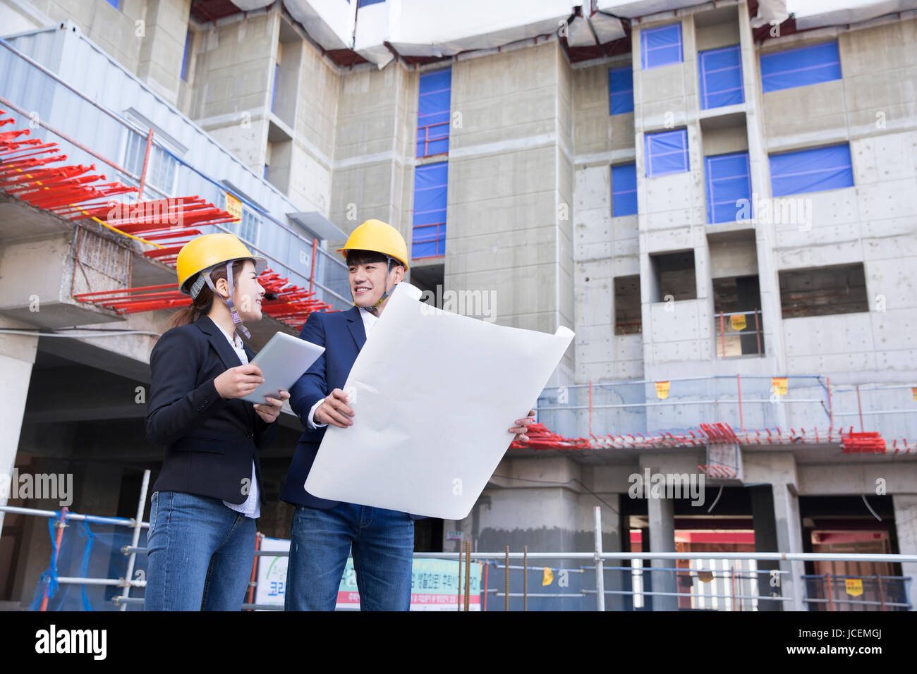 Two architects at construction site Stock Photo - Alamy
