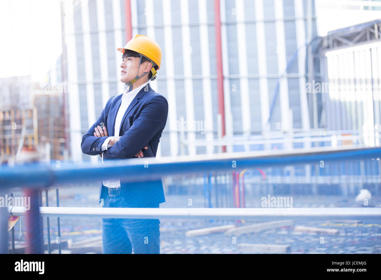 Side view of architect at construction site Stock Photo - Alamy