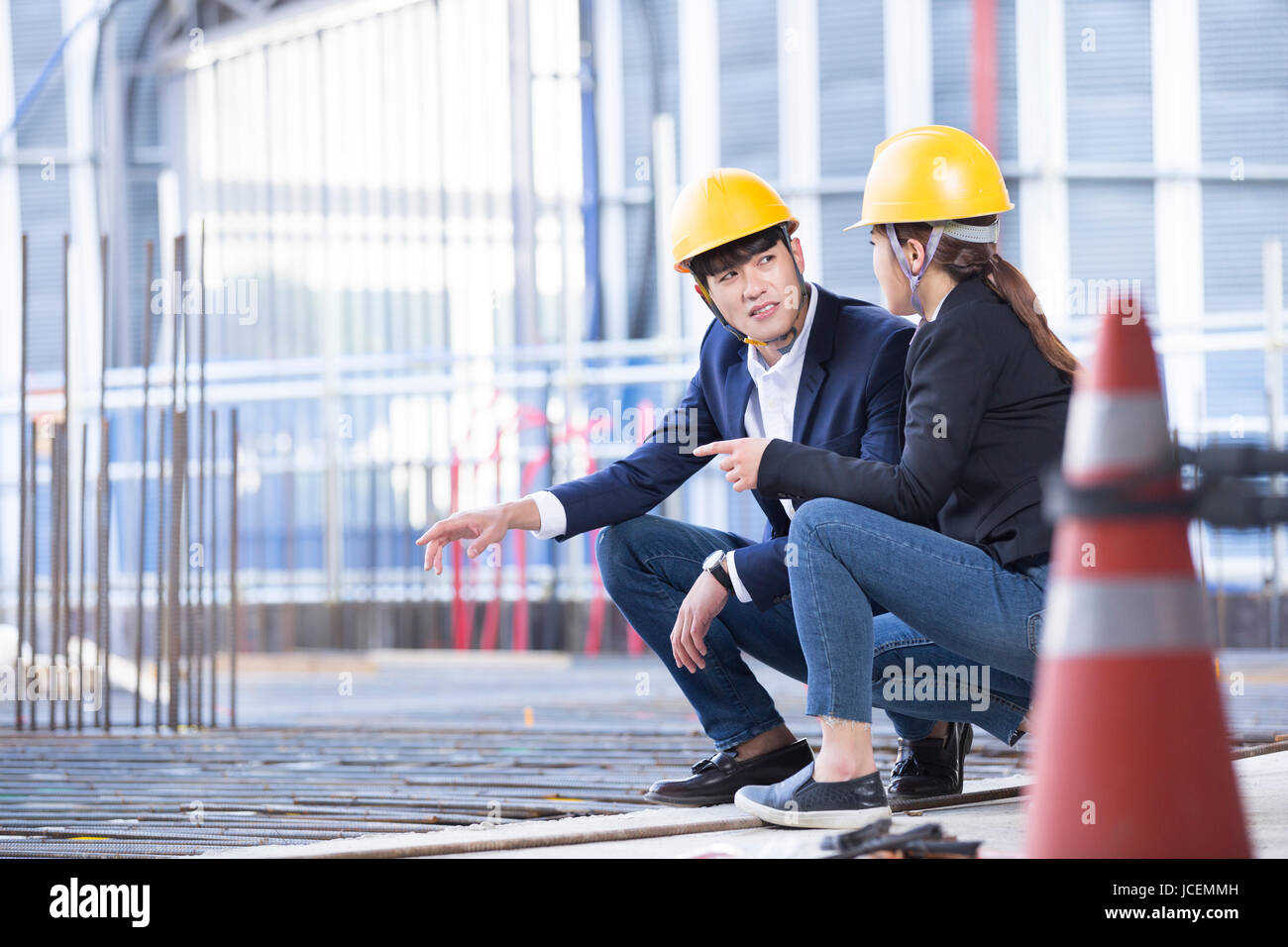 Two architects at construction site Stock Photo - Alamy