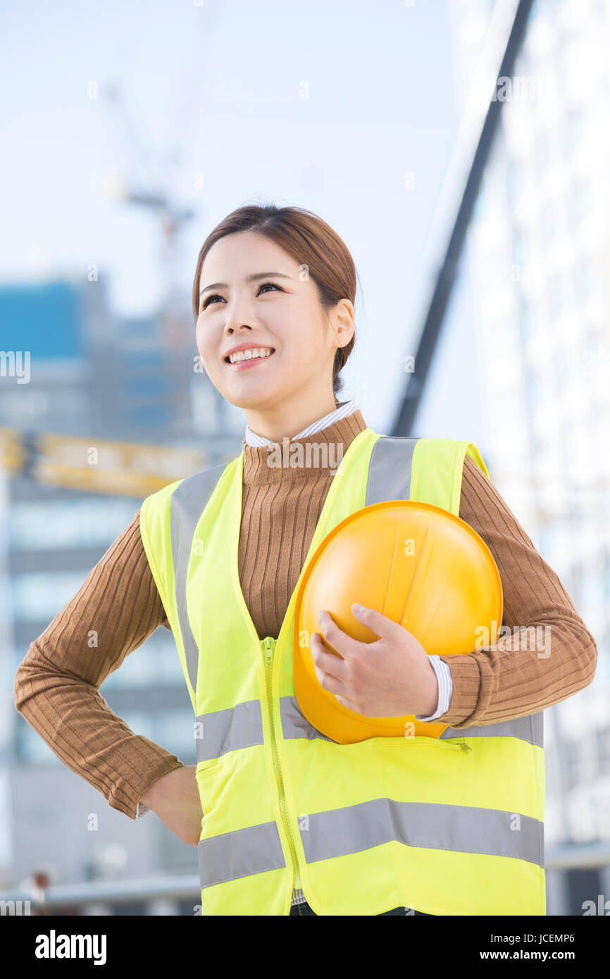 Female worker laughing on hi-res stock photography and images - Alamy