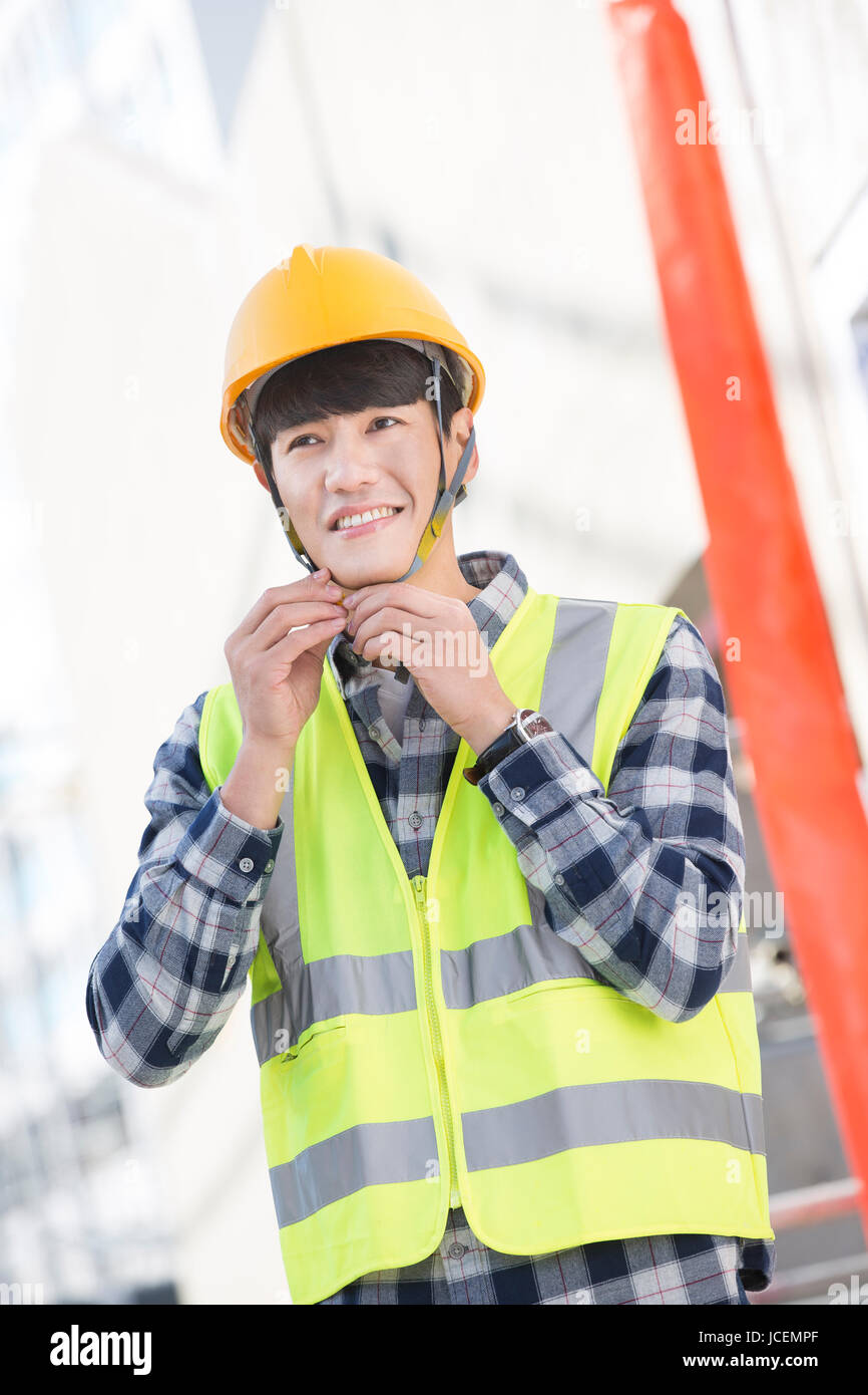 Smiling male construction worker hi-res stock photography and images ...