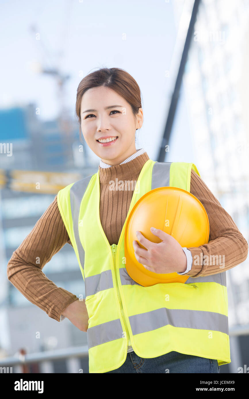 Female worker laughing on hi-res stock photography and images - Alamy
