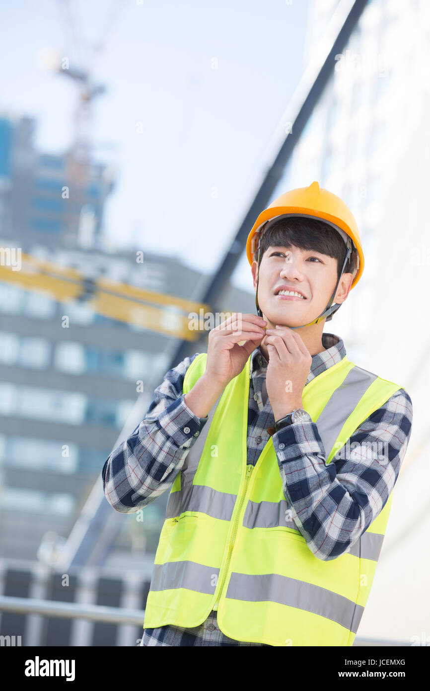 Smiling male construction worker hi-res stock photography and images ...